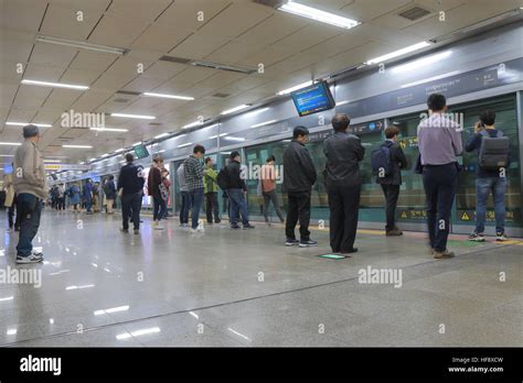 People Commute By Subway At Myeongdong Station In Seoul South Korea