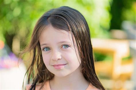 Premium Photo Close Up Portrait Of Cute Smiling Girl