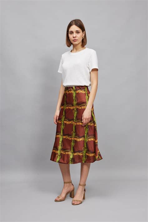 Dany Slip Satin Buckle Print Skirt In Brown Ylondon