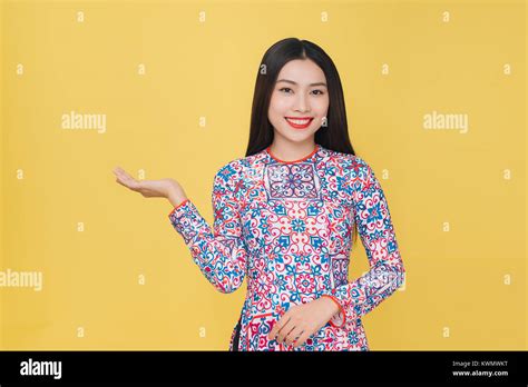 Attractive Vietnamese Woman Wearing Traditional Costume Isolated On