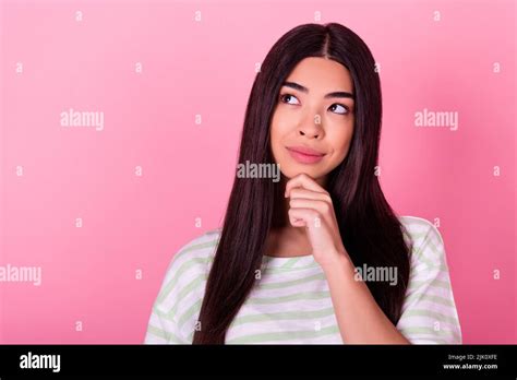 Photo Of Nice Positive Thai Girl Hand Touch Chin Look Interested Empty