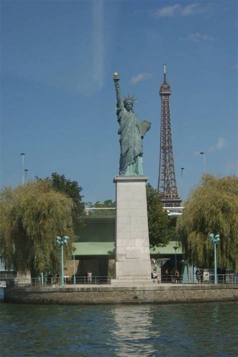 Statue Of Liberty And Eiffel Tower