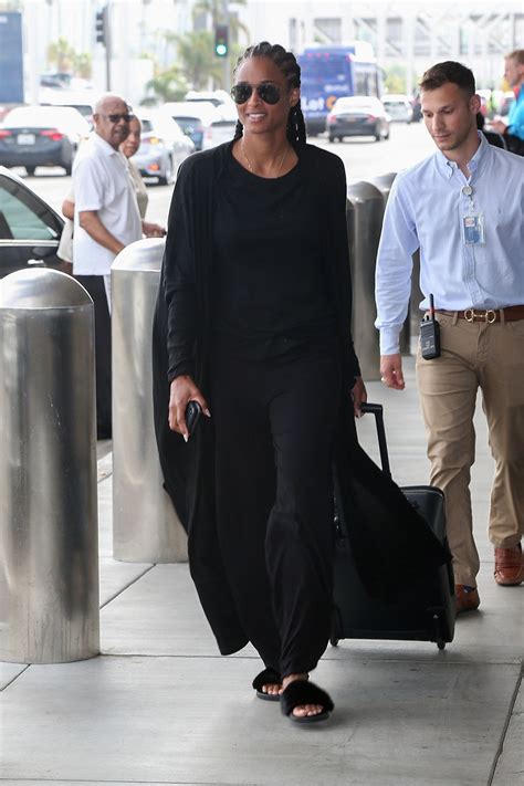 American Singer Ciara Rocks Braids As She Arrives In A Black Ensemble