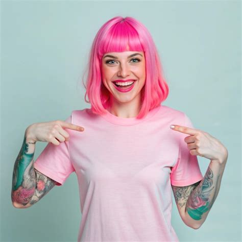 A Woman With Pink Hair Wearing A Pink Shirt Pointing At Something