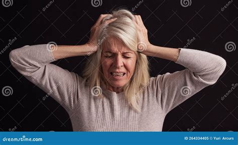 Senior Woman Stress Or Anxiety On Black Background In Studio In