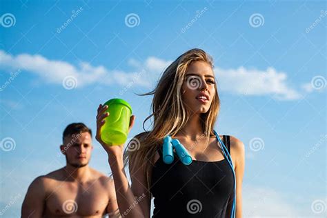 Slim Trainer Of Fitness Woman With Protein Shaker Smiling Young Female