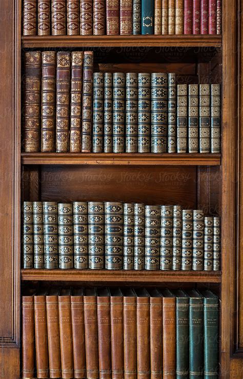 Books Organized On Old Library Shelf By Stocksy Contributor Matthew Spaulding Stocksy