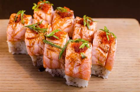 Beautiful Sushi Rolls With Tuna On A Wooden Plank Japanese Sushi With