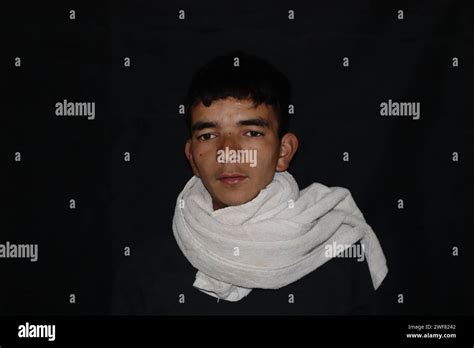 Picture Of Himalayan Adult Man With A Black Backround Photo Of