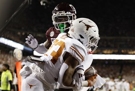No 3 Texas Holds Off No 20 Texas Aandm To Clinch Spot In Sec Title Game