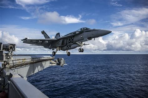 Fighter Jet Landing On Aircraft Carrier