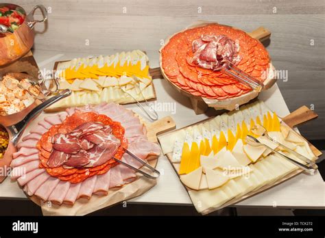 Tasty Fresh Meat And Cheese Buffet On A Wood Table Cold Buffet Spread