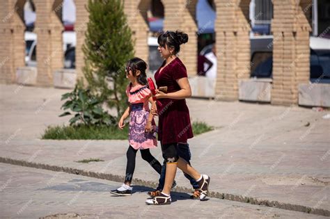Premium Photo A Mom And A Daughter Walking In Uzbekistan