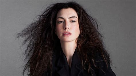 Anne Hathaway Talks Her Spring Must Haves Sheer Skirts Hanging Out With Donatella Versace