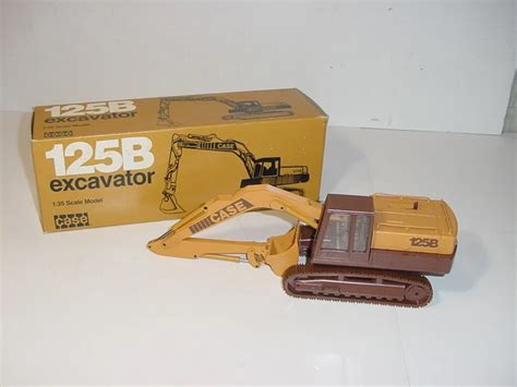 1 35 Case 125b Bagger Von Nzg 2965 Neu In Ovp Nie Ausgestellt Eur