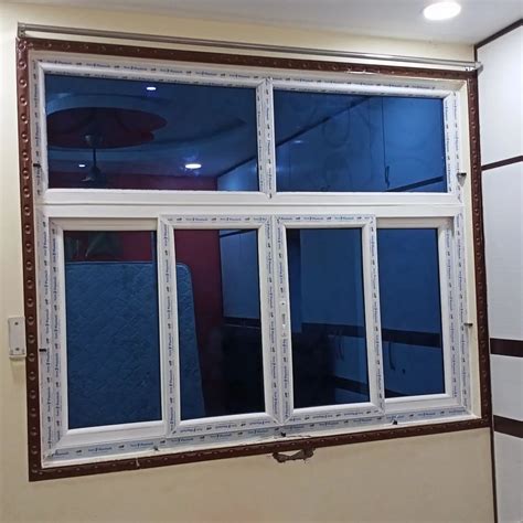 Upvc White 2 Track 4 Sash Sliding Window With Blue Reflected Glass At