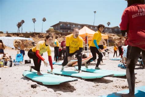 learn to surf with san diego surf school