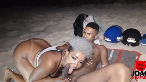 hot black brazilian couple gets late night sex on the beach video