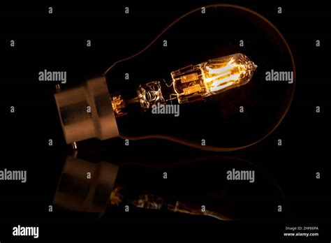 Illuminated light bulb without electricity or cables. Magic light bulb ...