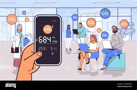 Hand Holding Air Quality Monitor Test On The Presence Of Dangerous Co2 Control Level Testing