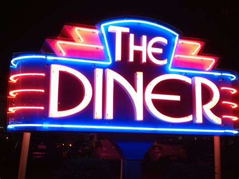 Vintage Neon Diner Sign At Midnight