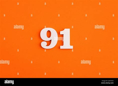 Number 91 On Orange Foam Rubber Background Stock Photo Alamy