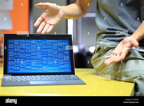 Computer Coding Presentation On Screen Mock Up Blue Binary Display On Laptop Monitor Notebook