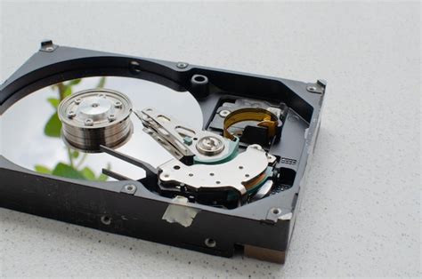 Premium Photo Closeup Of An Open Hard Drive Revealing Its Delicate And Sophisticated Parts
