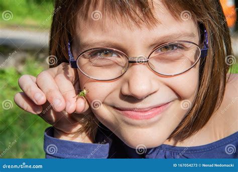 Girl With A Grasshopper On A Hand Stock Image Image Of Horizontal