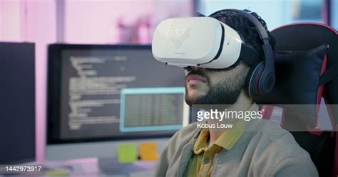 Man With Computer Coding Programmer With Vr Headset And Working With