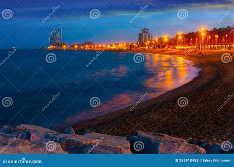 Illuminated Barceloneta Beach On Mediterranean Coastline On Summer