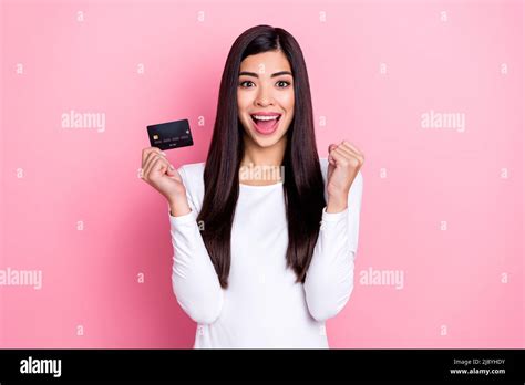 Photo Of Hooray Young Brunette Lady Hold Card Yell Wear White Shirt