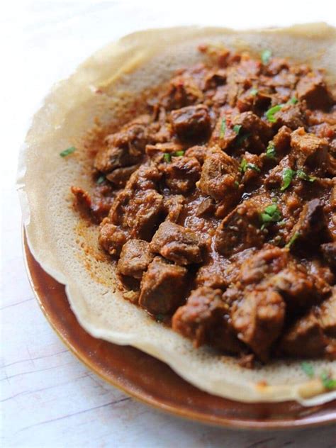Solve ዝግኒ ቀይ ወጥ Eritrean Zigni Goat Stew Jigsaw Puzzle Online With