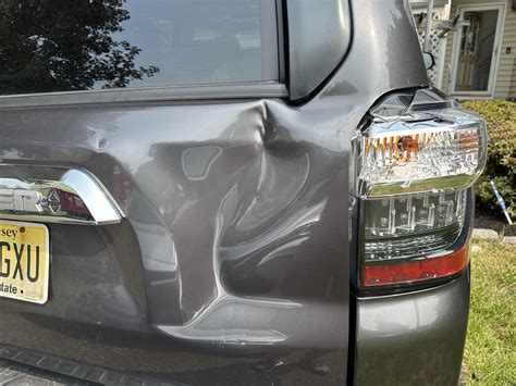 Brother Backed Into A Dumpster While I Was On My Cruise Massive Dent