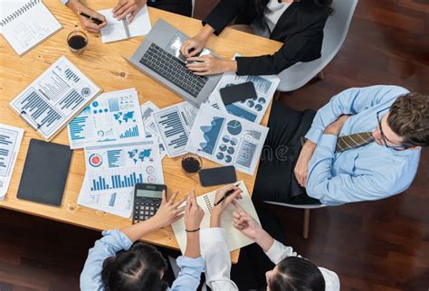 Top View Diverse Analyst Team Analyzing Financial Data Meticulous