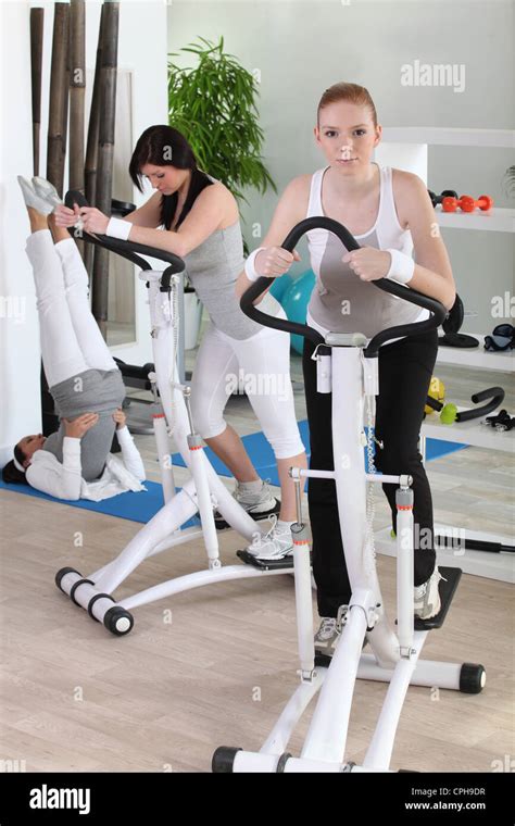Women Using Stepper Machine In Gym Stock Photo Alamy