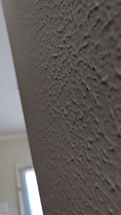 Hanging Plexiglass Art On Textured Walls Rdecor