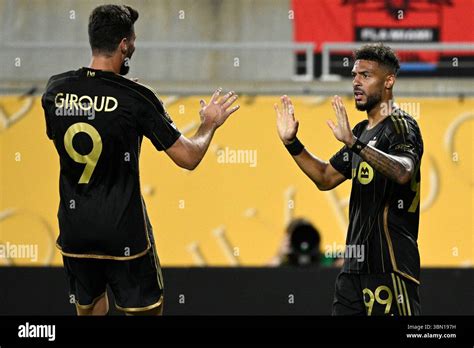 Los Angeles Fcs Denis Bouanga 99 Celebrates His Goal With Teammate Olivier Giroud 9 During