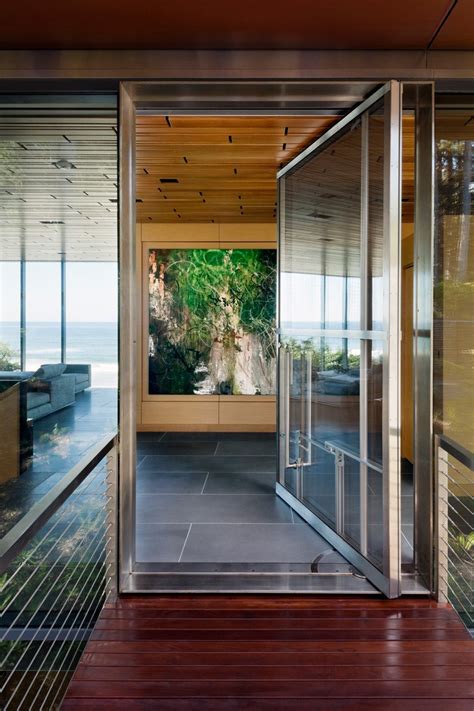 12 Extraordinary Houses With Glass Front Doors