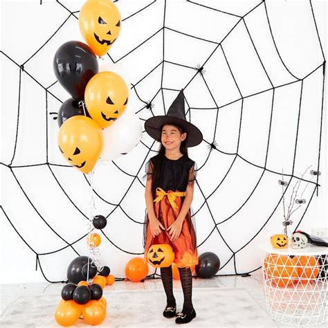 Premium Photo Portrait Of A Girl Holding Balloons