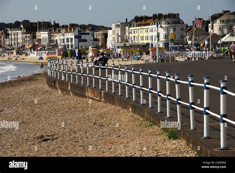 The Georgian Weymouth Seafront With The Beach Houses And Railings Uk