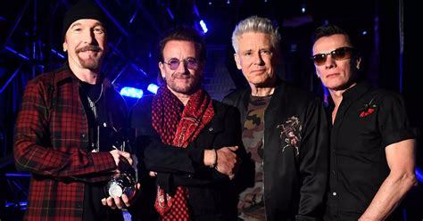 U2s Adam Clayton Rubbishes Rumours Larry Mullen Wont Go On Tour With