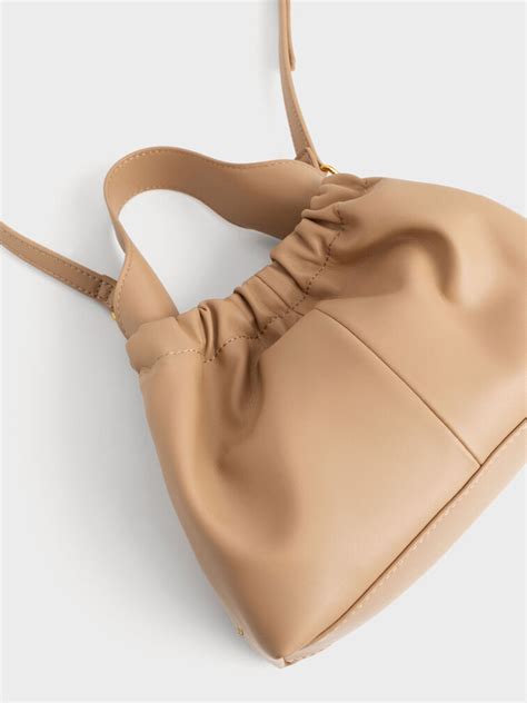 Beige Ally Ruched Slouchy Bucket Bag Charles And Keith Sg