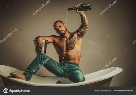 Sexy Undress Man Sit On Bathtub In Bathroom Men Holiday With Champagne