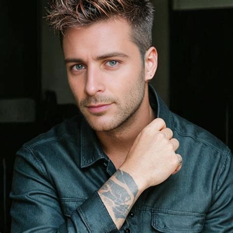 Stylish Man With Modern Hairstyle In Trendy Denim Shirt And Artistic