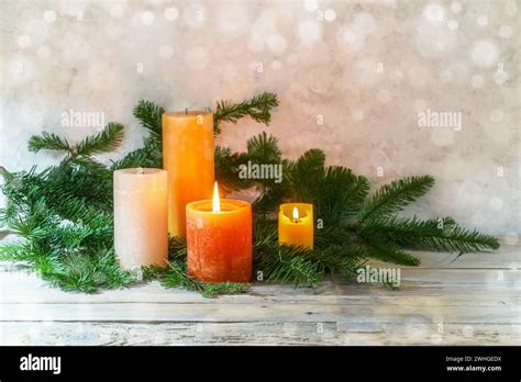 Second Advent Arrangement With Four Candles In Orange And Yellow Two