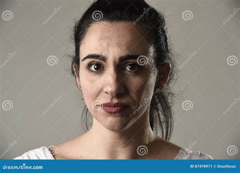 Beautiful And Sad Woman Crying Desperate And Depressed With Tears On