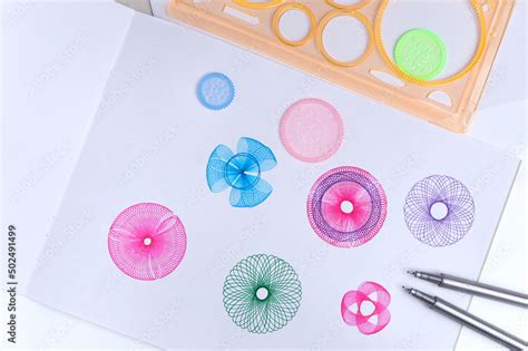 Spirograph Ruler On White Background Drawing The Spirograph Pattern On