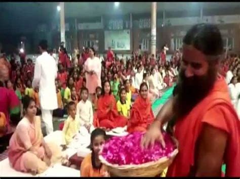 Haridwar Baba Ramdev Celebrates Holi With Flowers Zee News