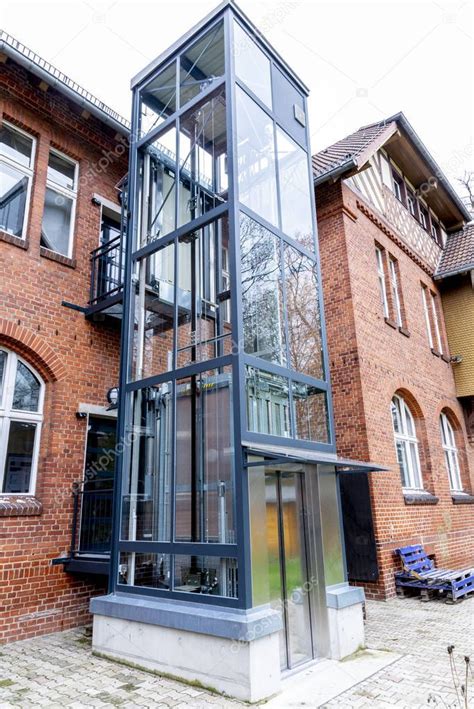 Glass Elevator Outside Building At Davina May Blog